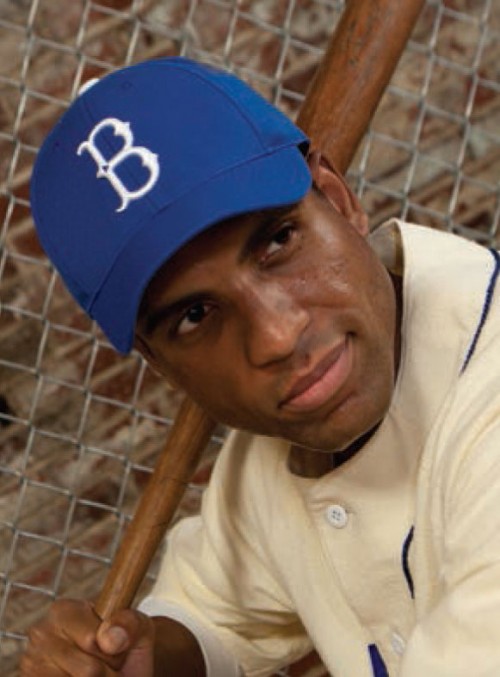 Reginald Pierre fills giant cleats in ‘Jackie and Me’ - St. Louis American